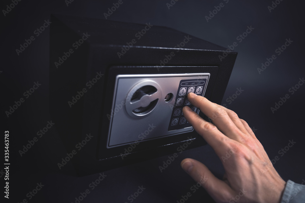 Cash Money Safe Deposit. Symbol of money safety. Man open small ...