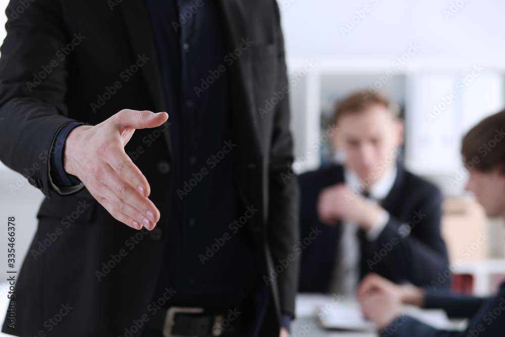 Businesswoman offer hand to shake as hello in office closeup. Serious ...