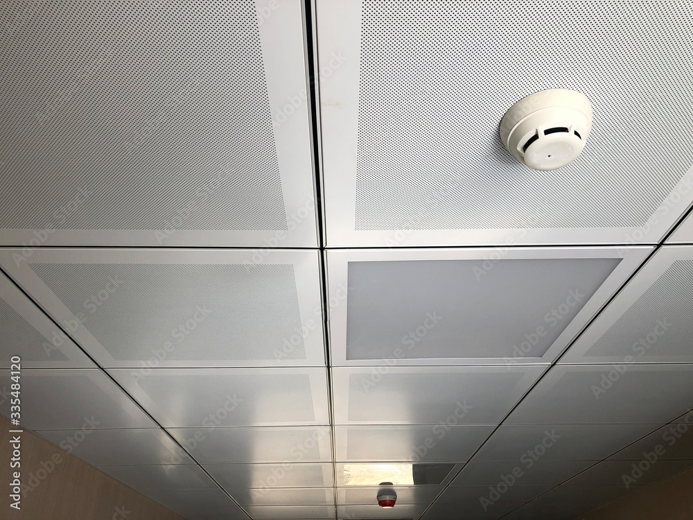 Fire detector at false ceiling. Fire alarm system Stock Photo | Adobe Stock