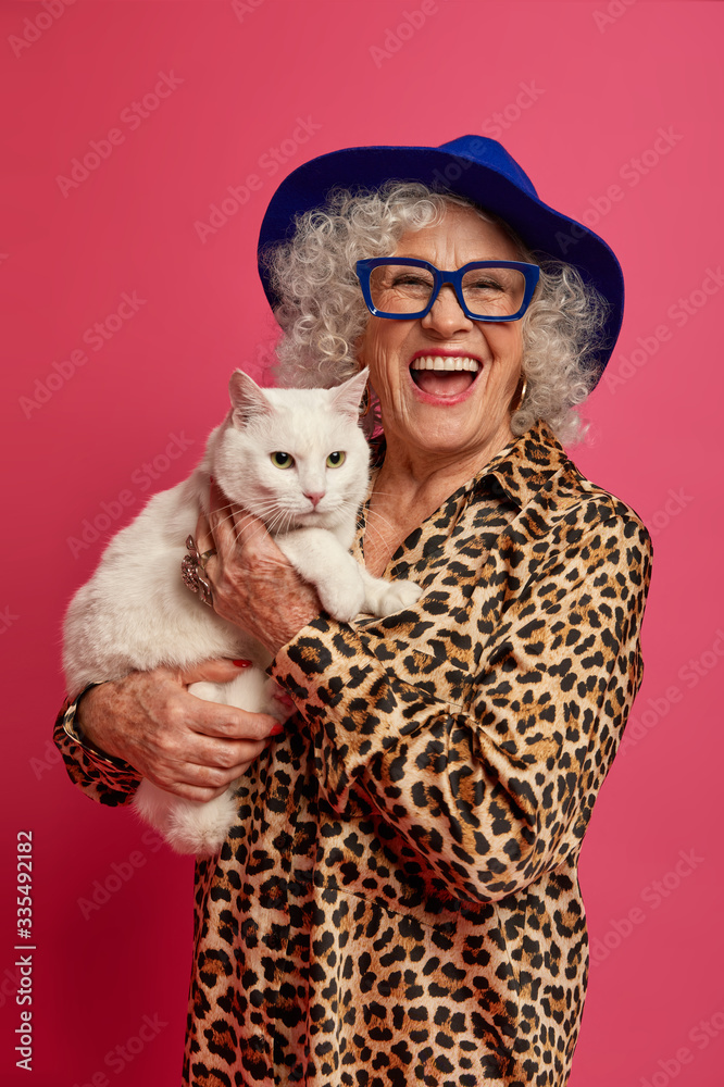 Old wrinkled lady on retirement feels not lonely in company of favorite ...