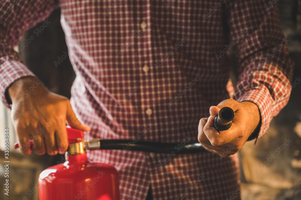 Close up hand Fireman using fire extinguisher fighting. Stock Photo ...