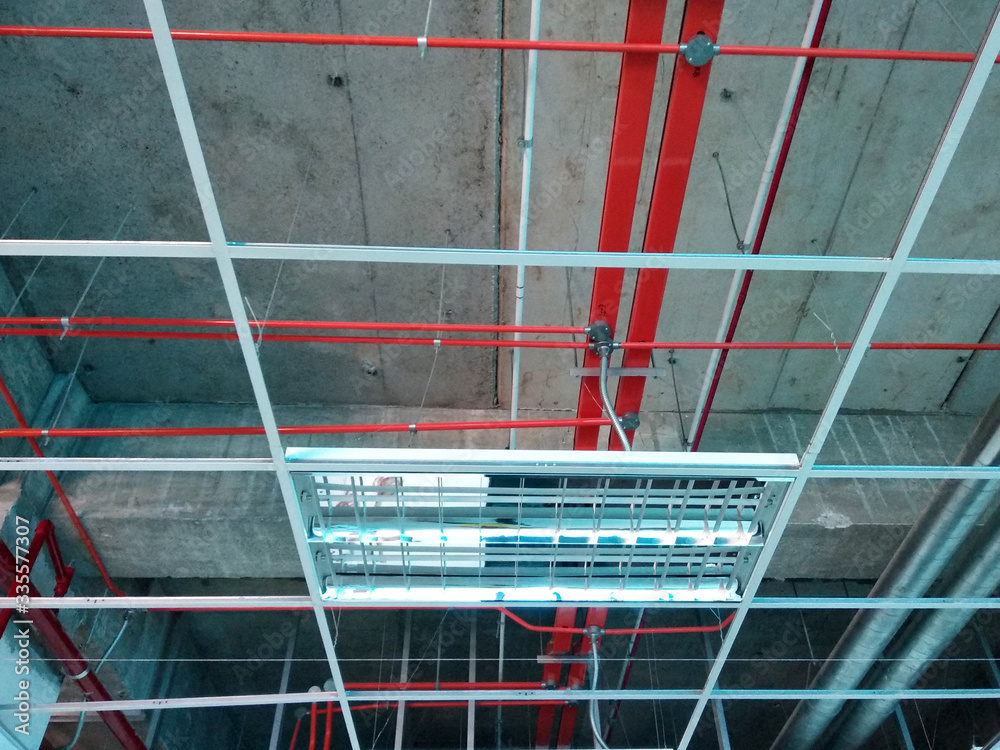 Suspended ceiling frame and board under construction at the ...
