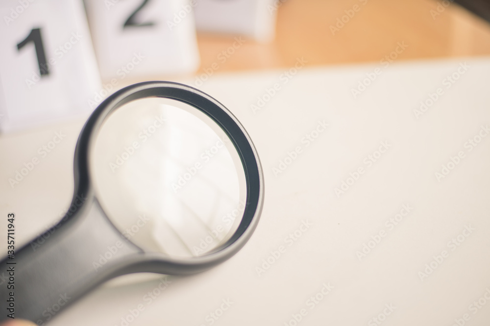 Magnify and evidence form investigation crime. Stock Photo | Adobe Stock
