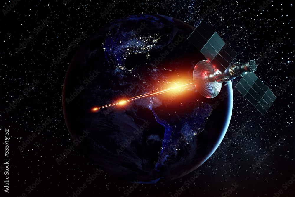 Space military satellite, a weapon in space shoots a laser against the ...
