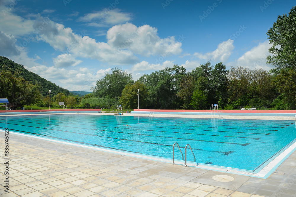 Swimmer in the Olympic swimming pool with clear blue water Stock Photo ...