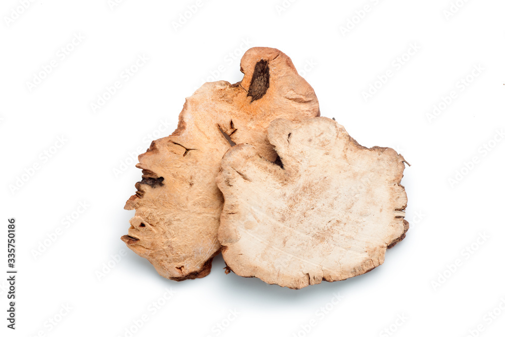 Smilax glabra rhizome (tu fu ling) on white background. Chinese herbal ...