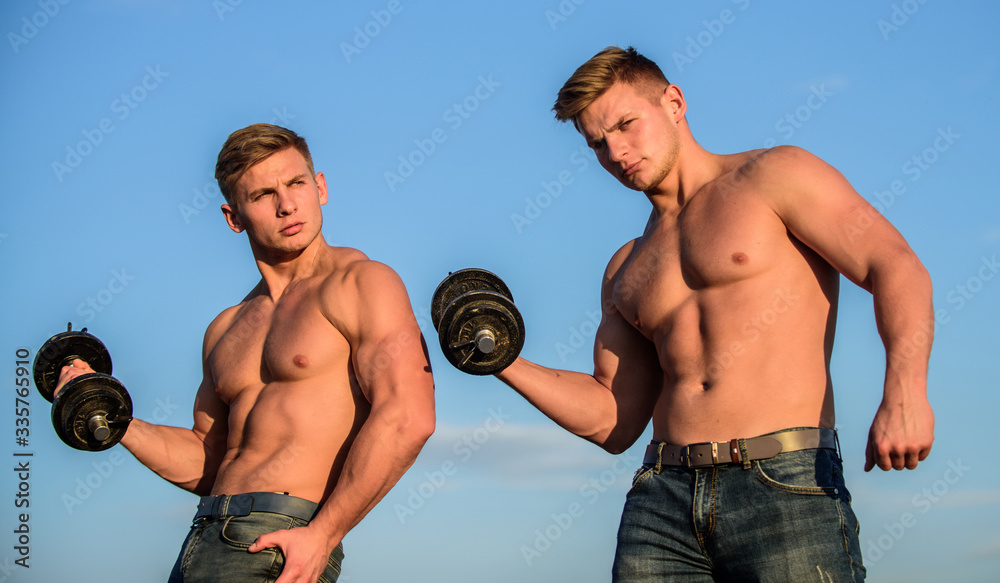 Strong muscular athlete bodybuilder. Attractive twins. Sexy torso ...