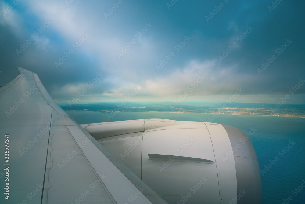 Looking through window aircraft during flight in wing with an island ...