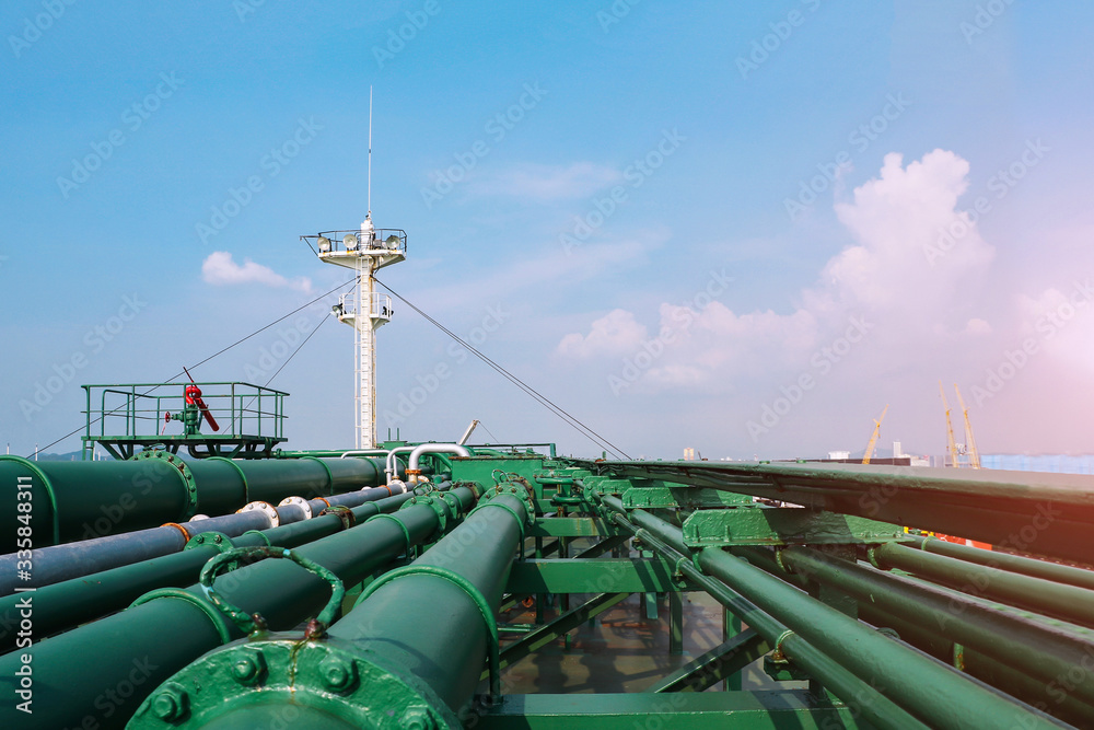 Pipe line on tanker ship at the large tank, oil under loaded at Main ...