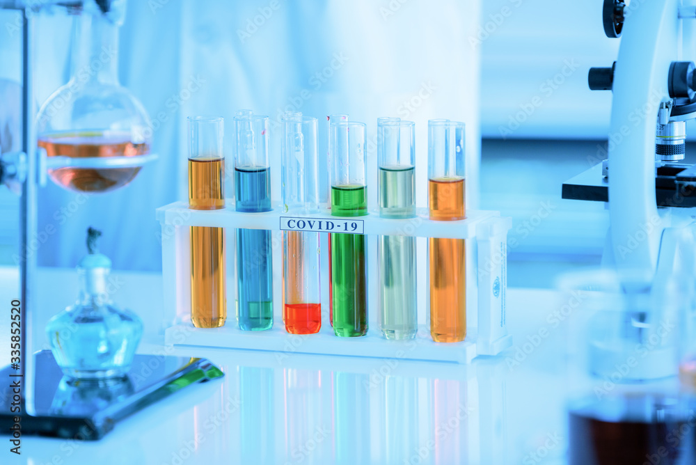 A tube of biological sample contaminated by coronavirus with label ...