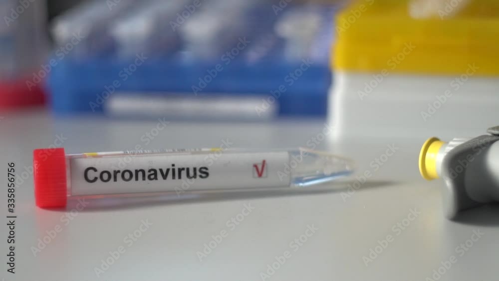 coronavirus test. Test tube lying on inspiratory protective respiratory ...