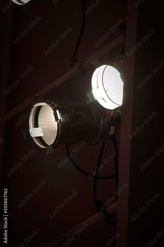 Spotlight with directional light with a Fresnel lens, halogen lamp and ...