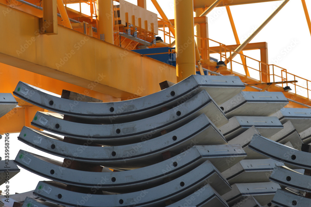 Curved interlocking pre cast concrete segments held in storage for the ...