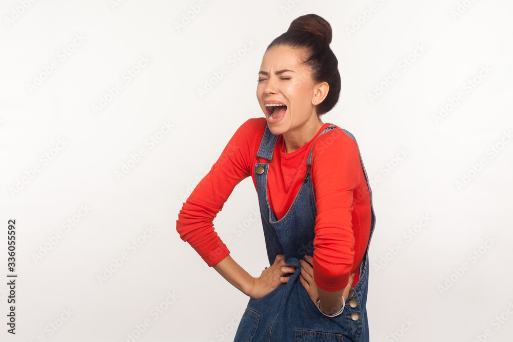 Acute abdominal cramps, gastrointestinal problem. Portrait of sick girl ...