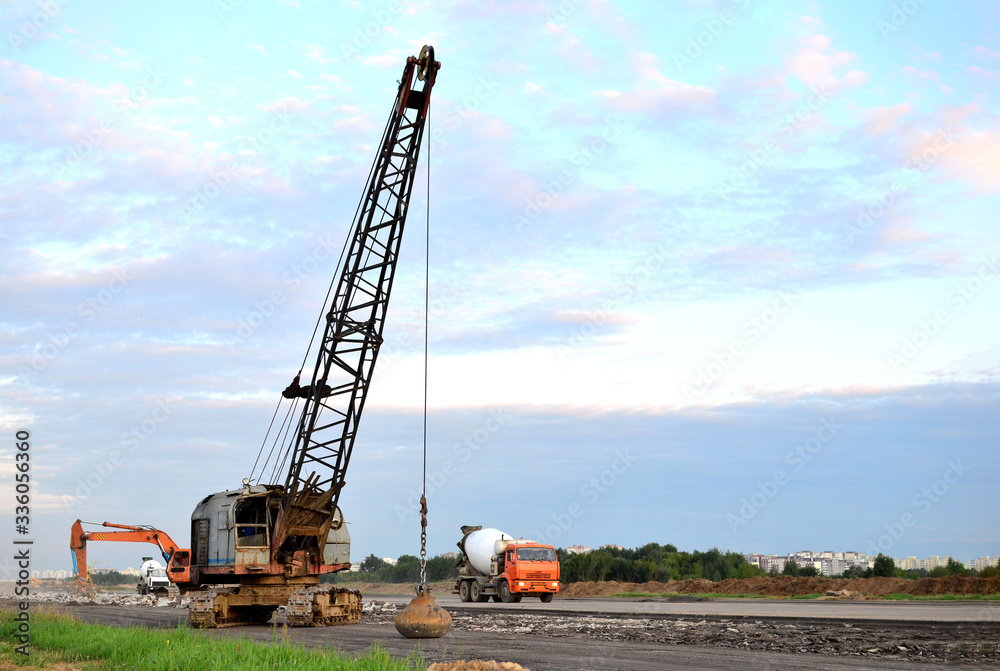 Large crawler crane or dragline excavator with a heavy metal wrecking ...