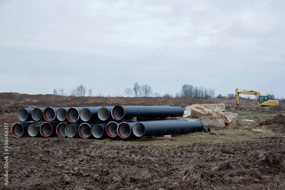 Black sewer pipes for laying an external sewage system at a ...