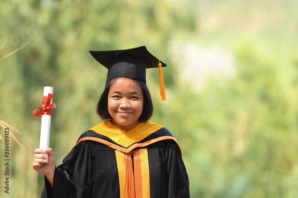 Asian students wore black frilly suits, black hats, yellow tassels on ...