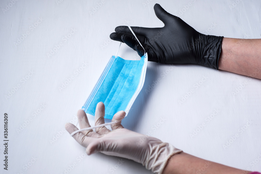 sanitary mask with one blue face and the other white with two elastic ...