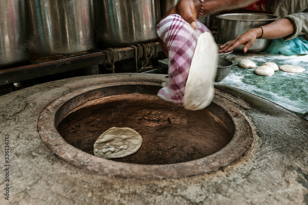 Tandoori naan or roti, an indian bread baked in clay oven Stock Photo ...
