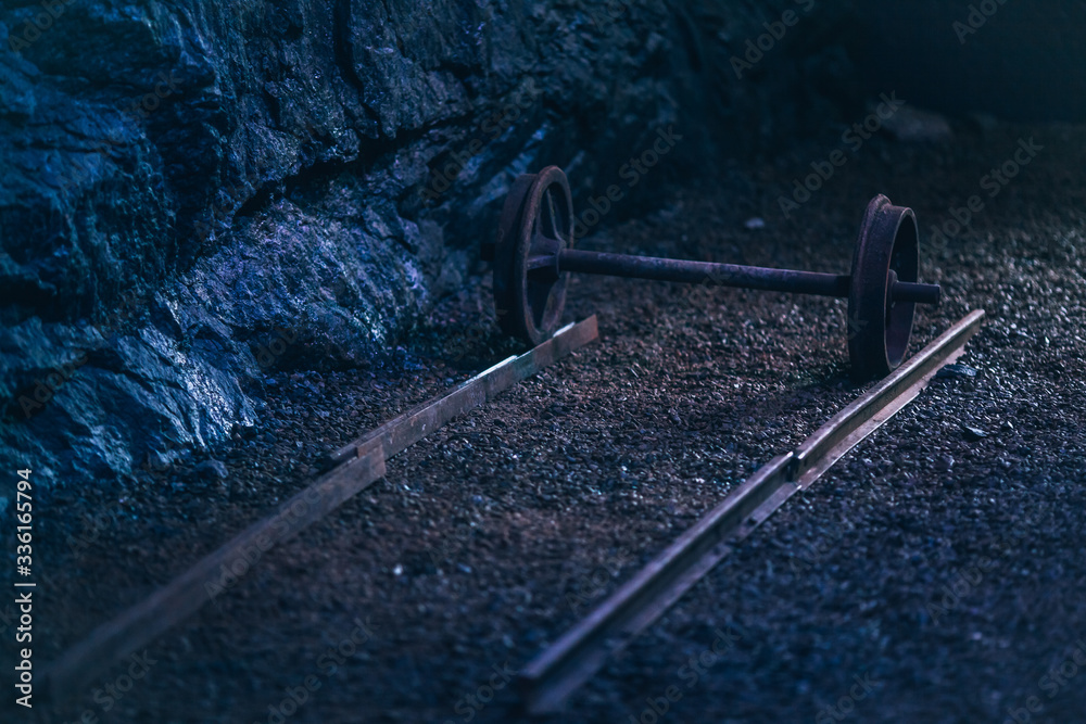 Foto de Mining, an old railway in the rock. Wheels from a mining truck ...