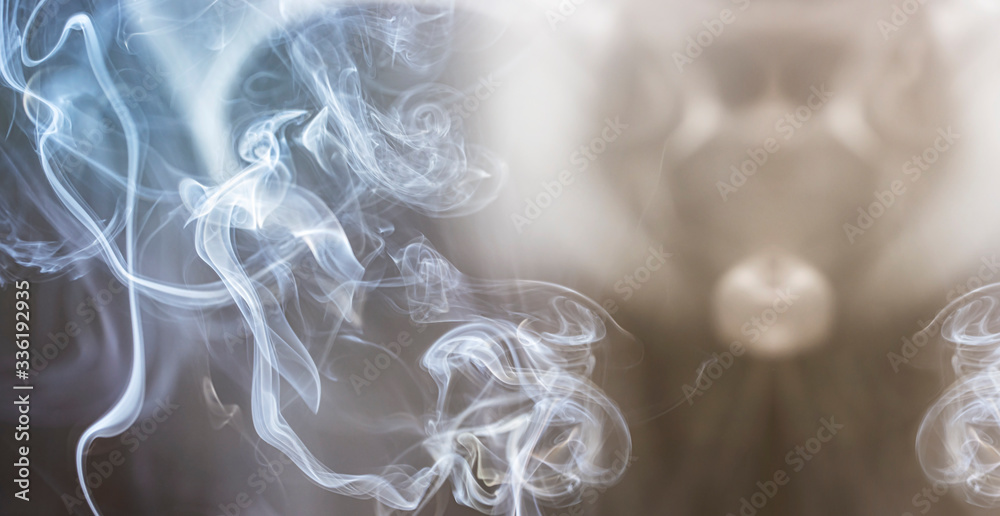 Cigarette smoke on a light background Stock Photo | Adobe Stock