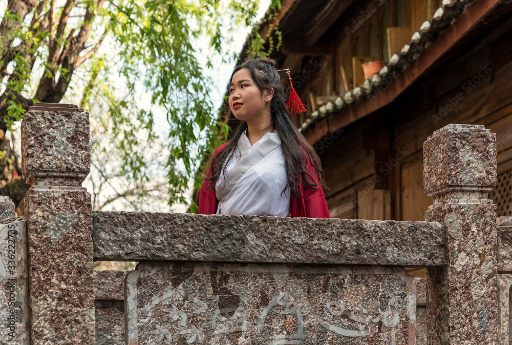 Chinese woman with traditional clothes Stock Photo | Adobe Stock