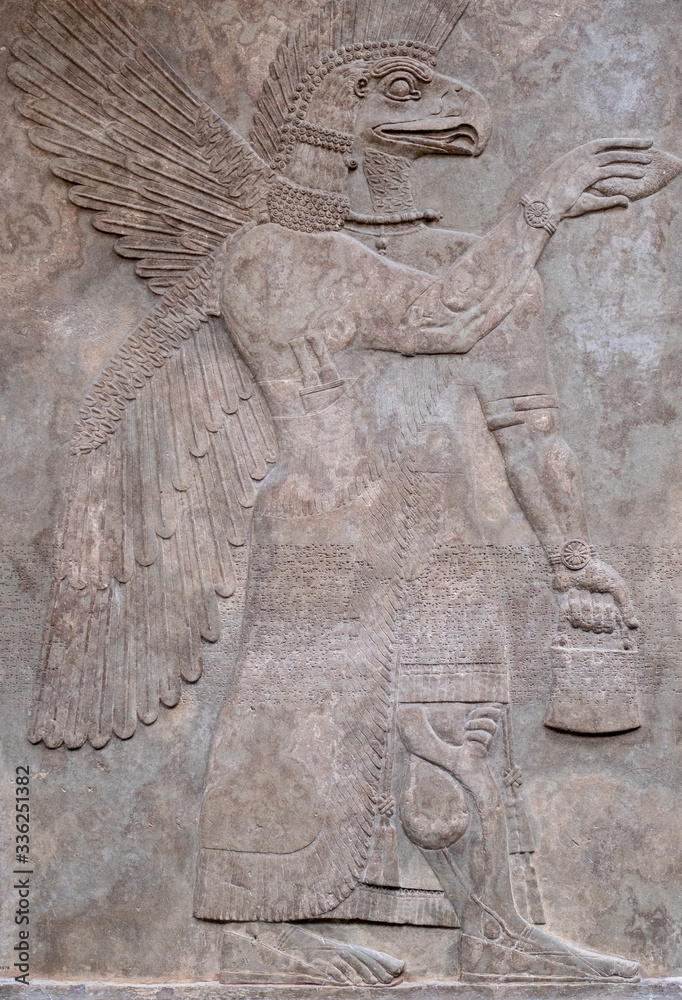 Ancient persian bas-relief depicting a winged god with the head Stock ...