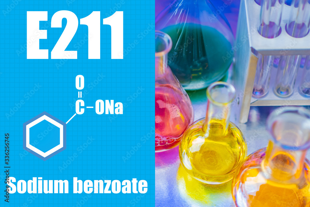 Sodium benzoate in medecine. E211 on a blue background. Concept - the use of sodium benzoate in ...