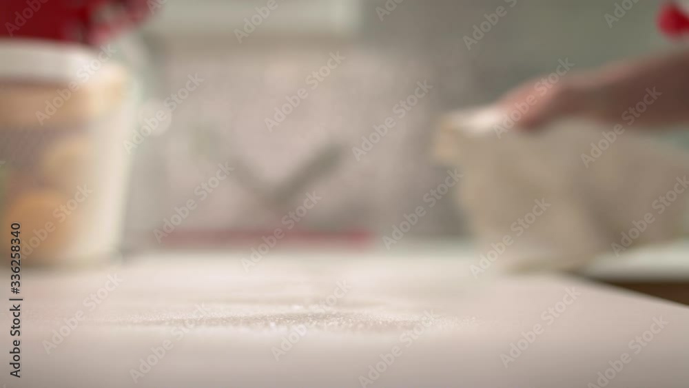 Wipe kitchen countertop with sanitizer. Cleaning house. Shot in 4k on ...