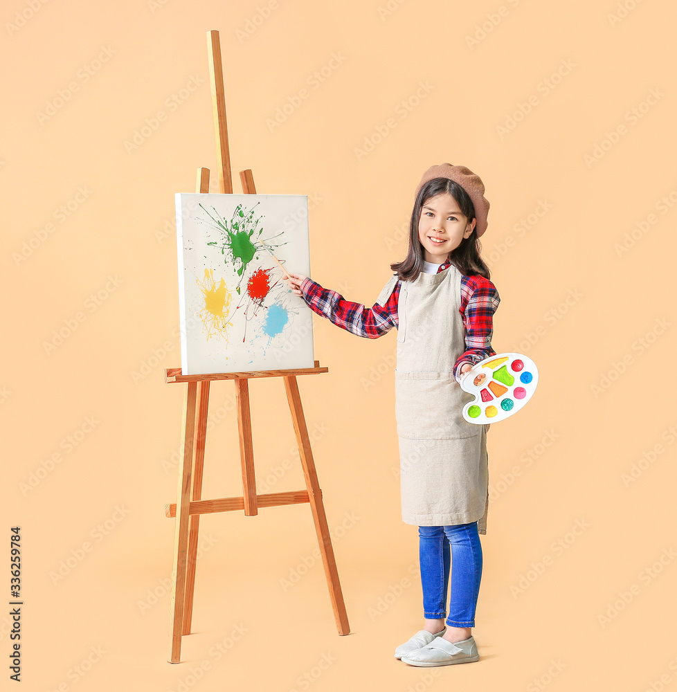 Cute little artist on color background Stock Photo | Adobe Stock