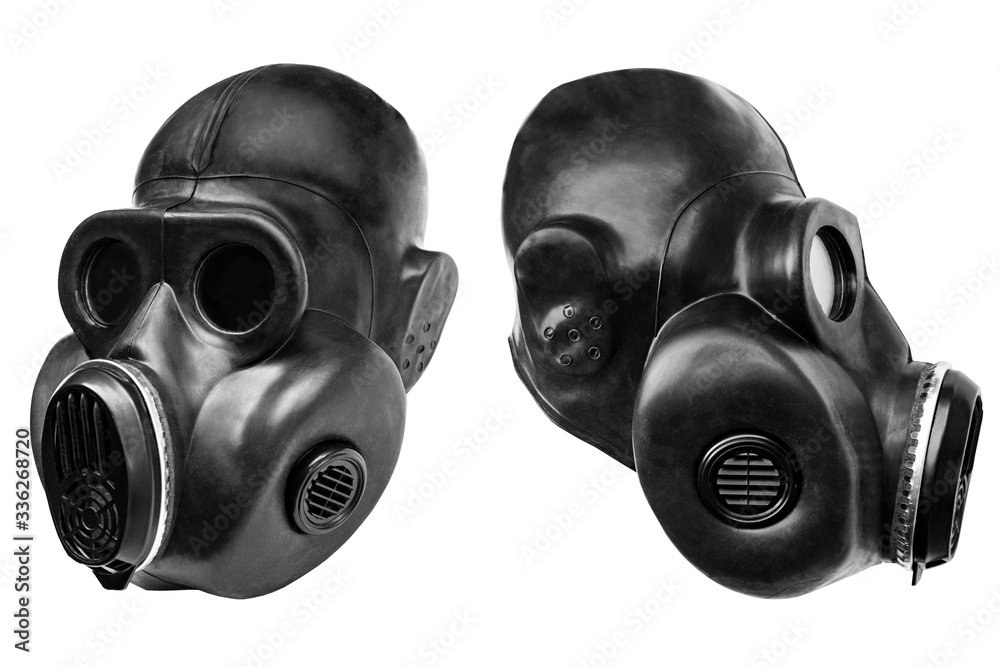 black rubber gas mask with integrated filters in two angles on a white ...