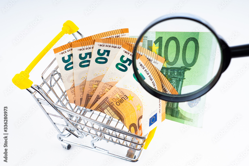Euro. Cost of an online store. Euro bills in a cart for a supermarket ...