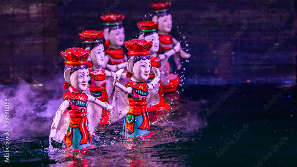 Photo & Art Print Traditional Vietnamese performance water puppet ...