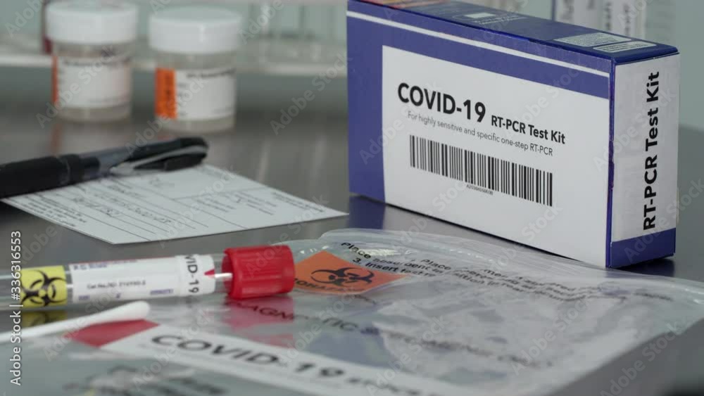 Covid- 19 Coronavirus test kit in medical lab with vile and swab. Stock ...