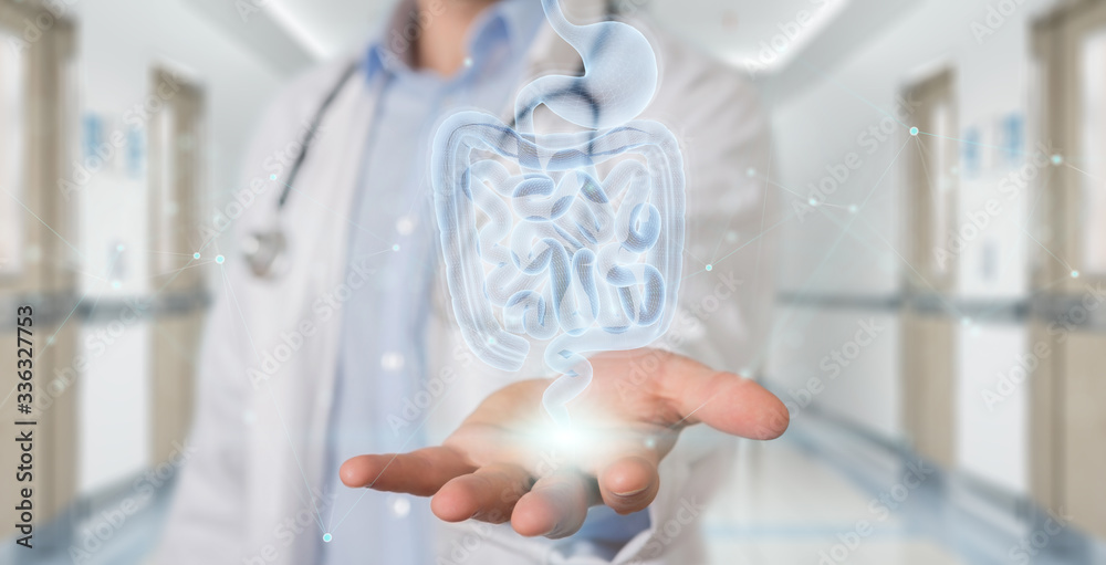 Gastroenterologist using digital x-ray of human intestine holographic ...