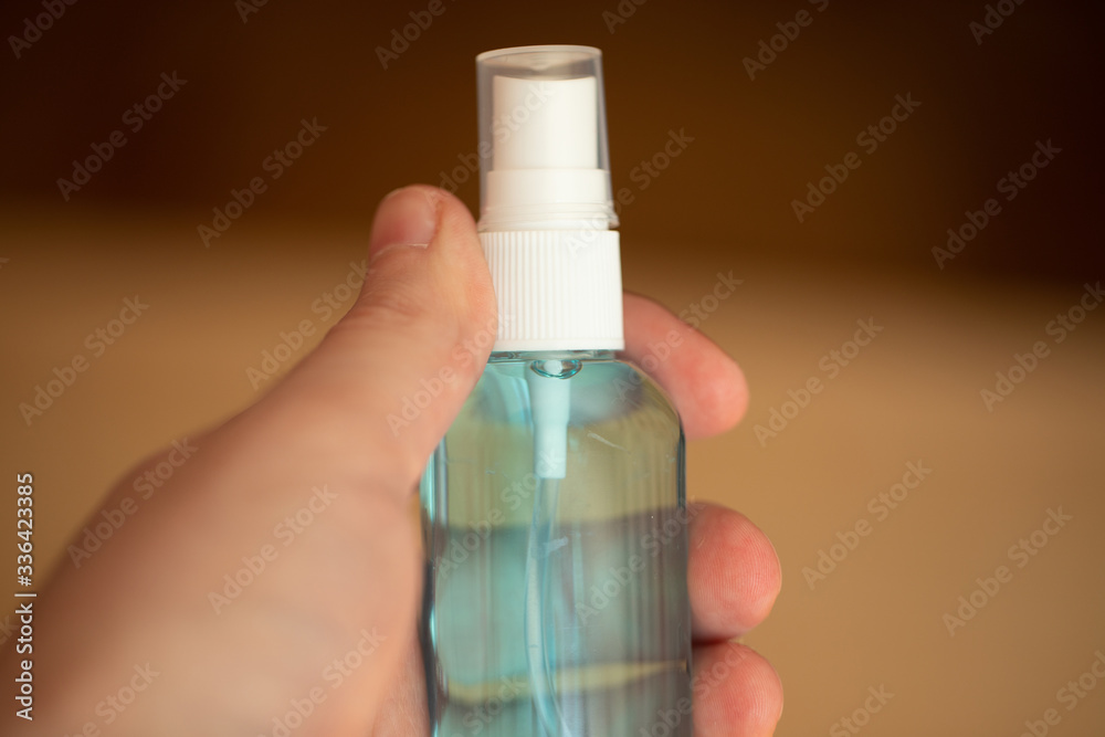 Bottle of antiseptic in hand Antibacterial spray for hands antiseptic ...