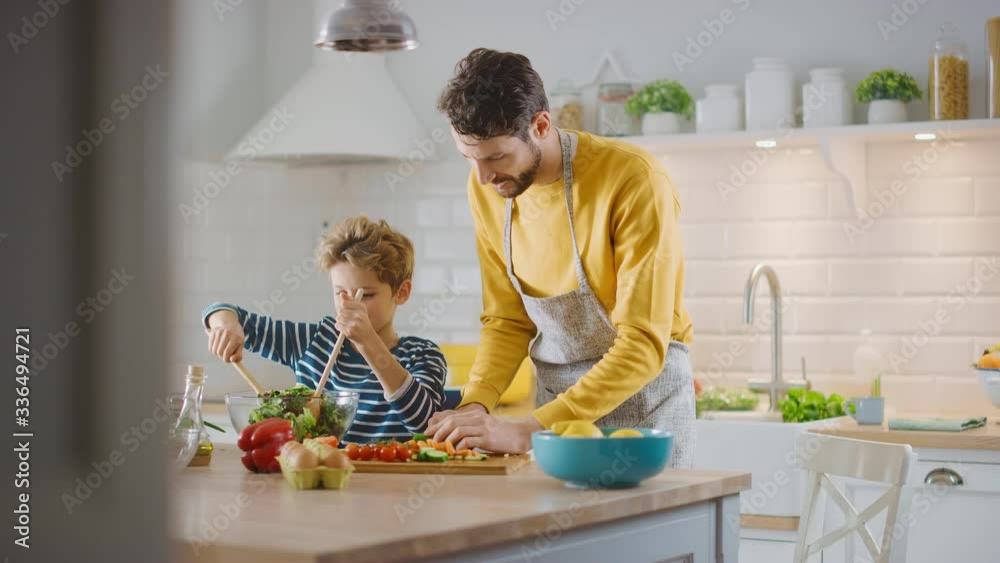 In Kitchen: Father and Cute Little Boy Cooking Together Healthy Dinner ...