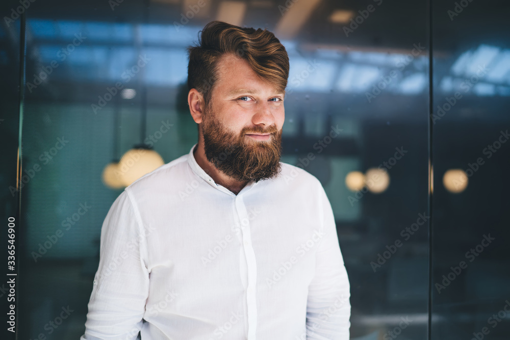 Half length portrait of masculine bearded businessman dressed in white ...
