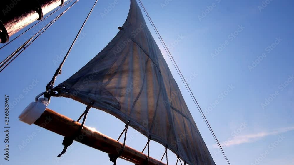 Vidéo Stock The front sail of an old ship being hoisted to set sail on ...