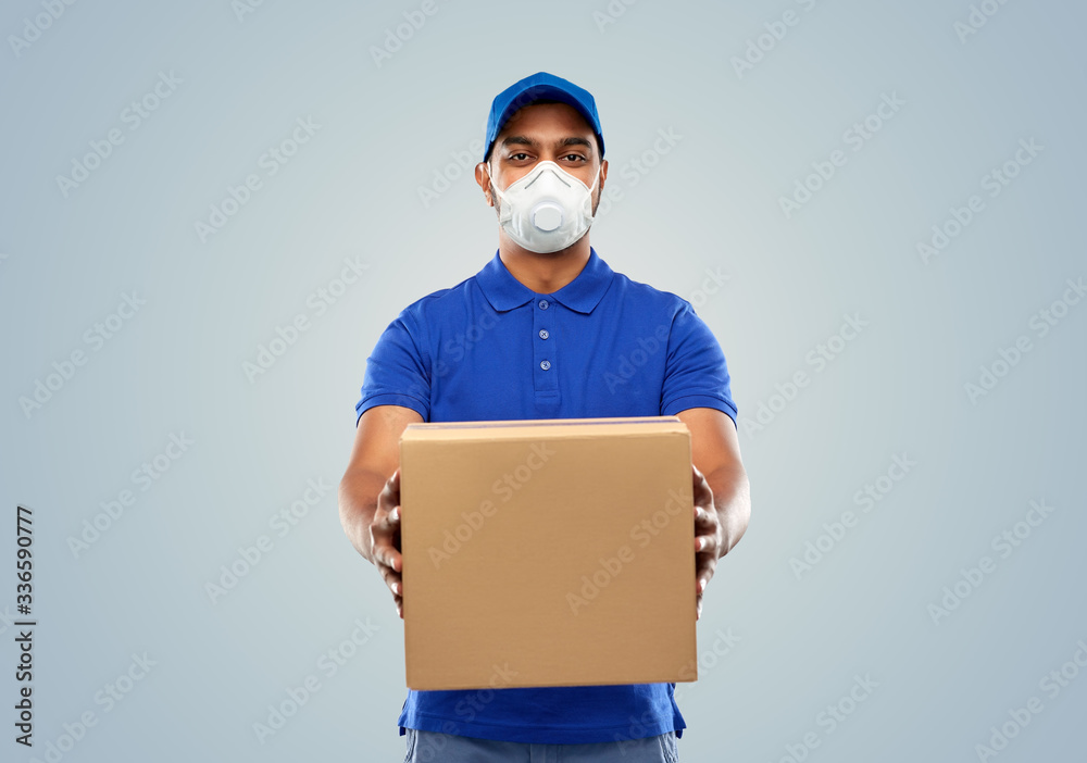 health, safety and pandemic concept - happy indian delivery man wearing ...