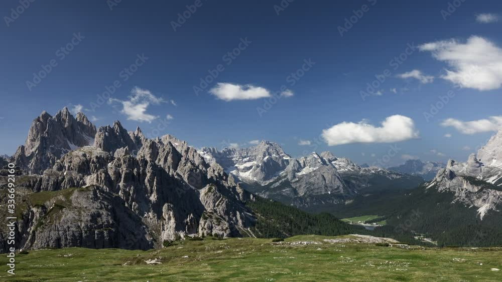 Time lapse of landscape at Dolomite Alps at Three Peaks in summer, with ...