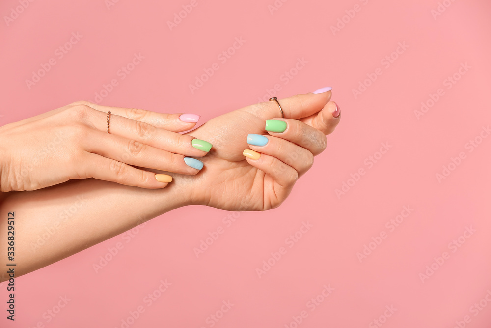 Hands of young woman with beautiful manicure on color background Stock ...