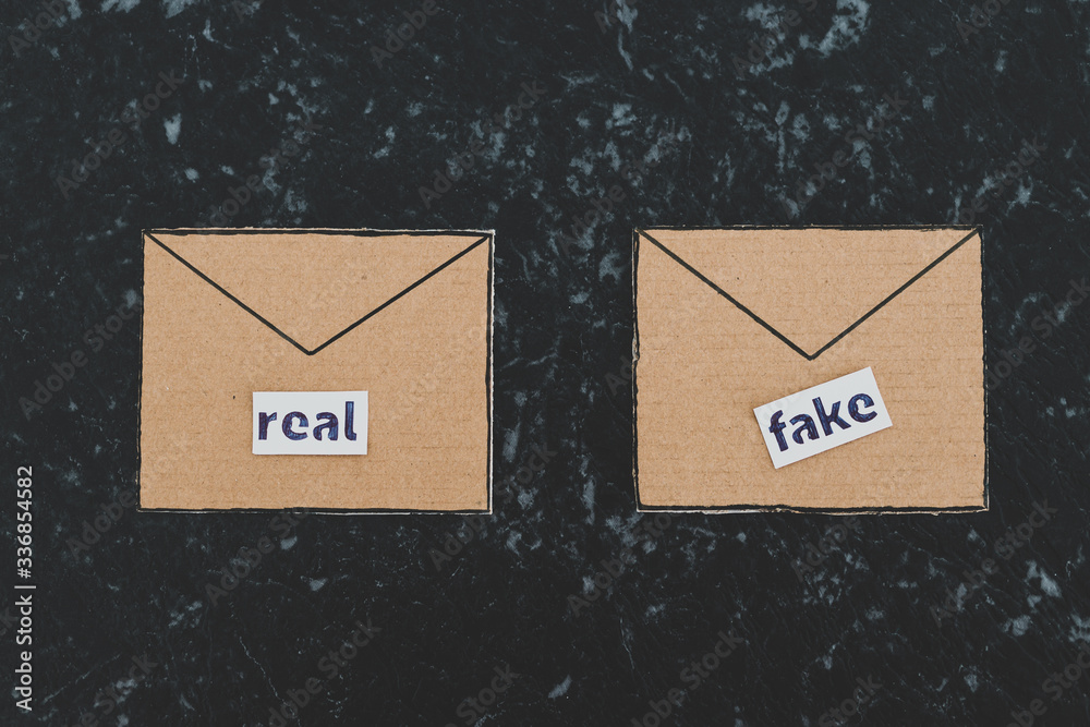 fake emails or online scams, email envelop icons with real vs fake ...