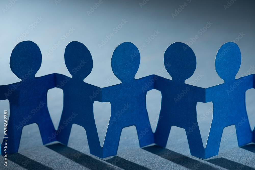 Paper dolls holding hands symbolizing union and team Stock Photo ...