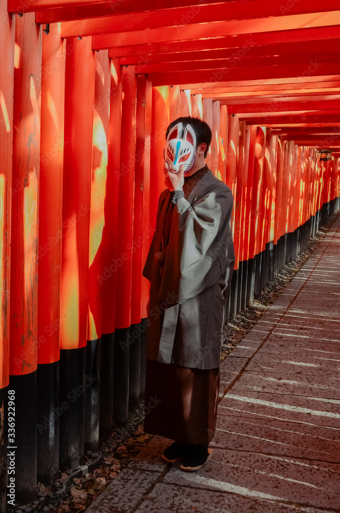 Kyoto, Japan. Fushimi Inari Shrine. Torii Tunnels. Young guy in ...