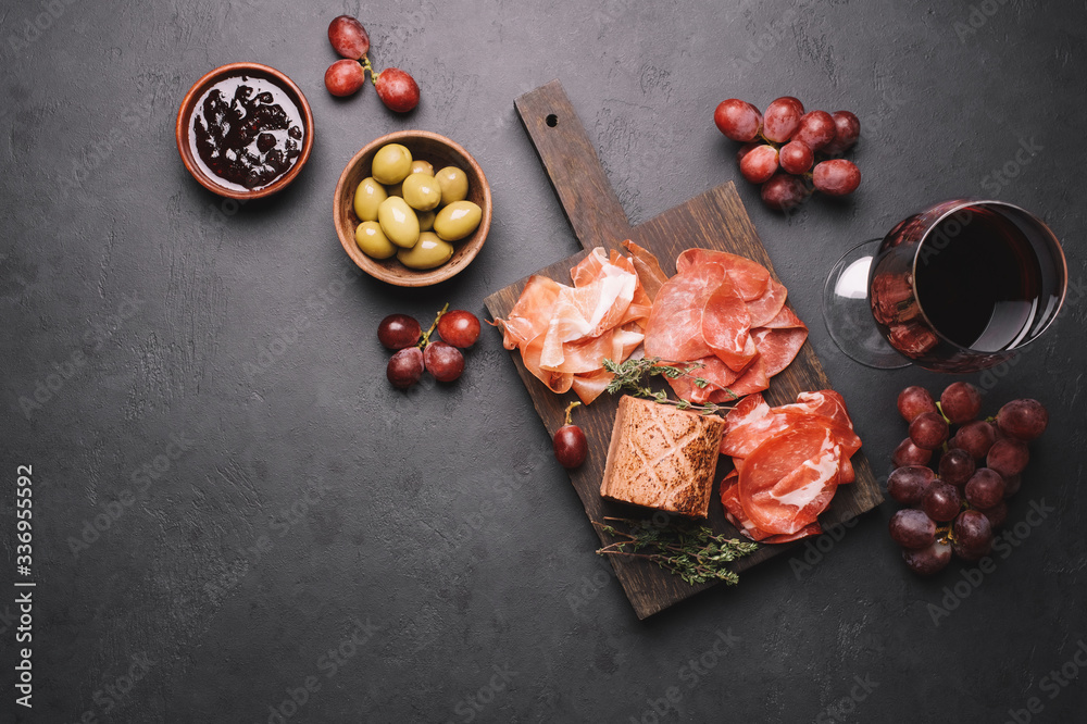 Assorted meat appetizers for wine. Bresaola, prosciutto, pork neck ...