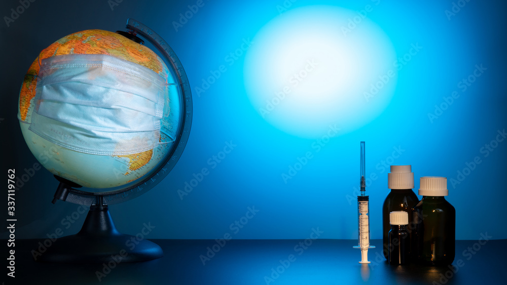 Globe of the earth in a medical mask. World quarantine, coronavirus ...