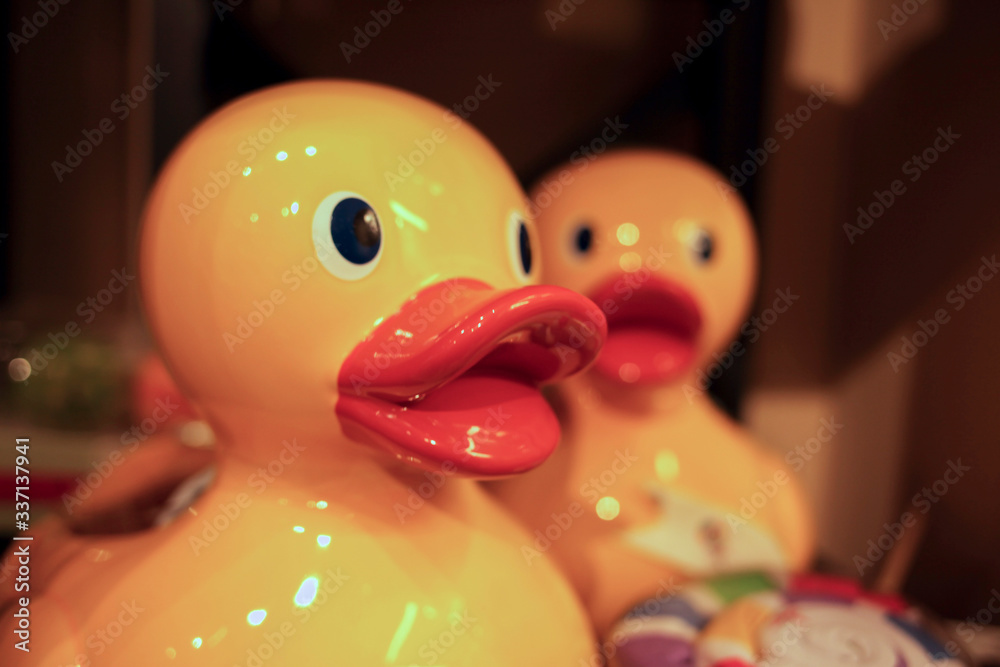Yellow porcelain duck figurines with bright orange beaks. Stock Photo ...
