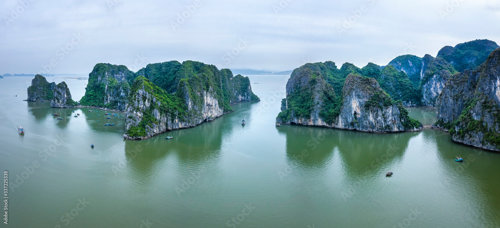 Aerial view Ba Hang floating fishing village, rock island, Halong Bay ...