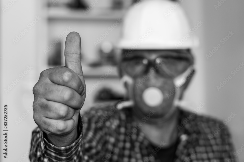 Positive emotion, worker shows thumbs up / Worker shows thumbs up, with ...
